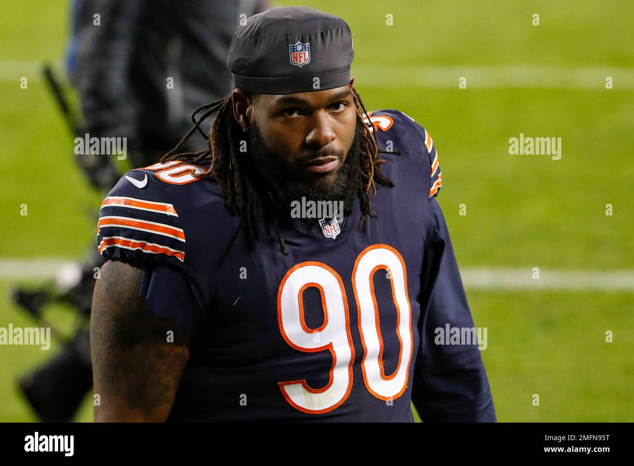 Chicago Bears defensive tackle John Jenkins (90) walks off the field ...