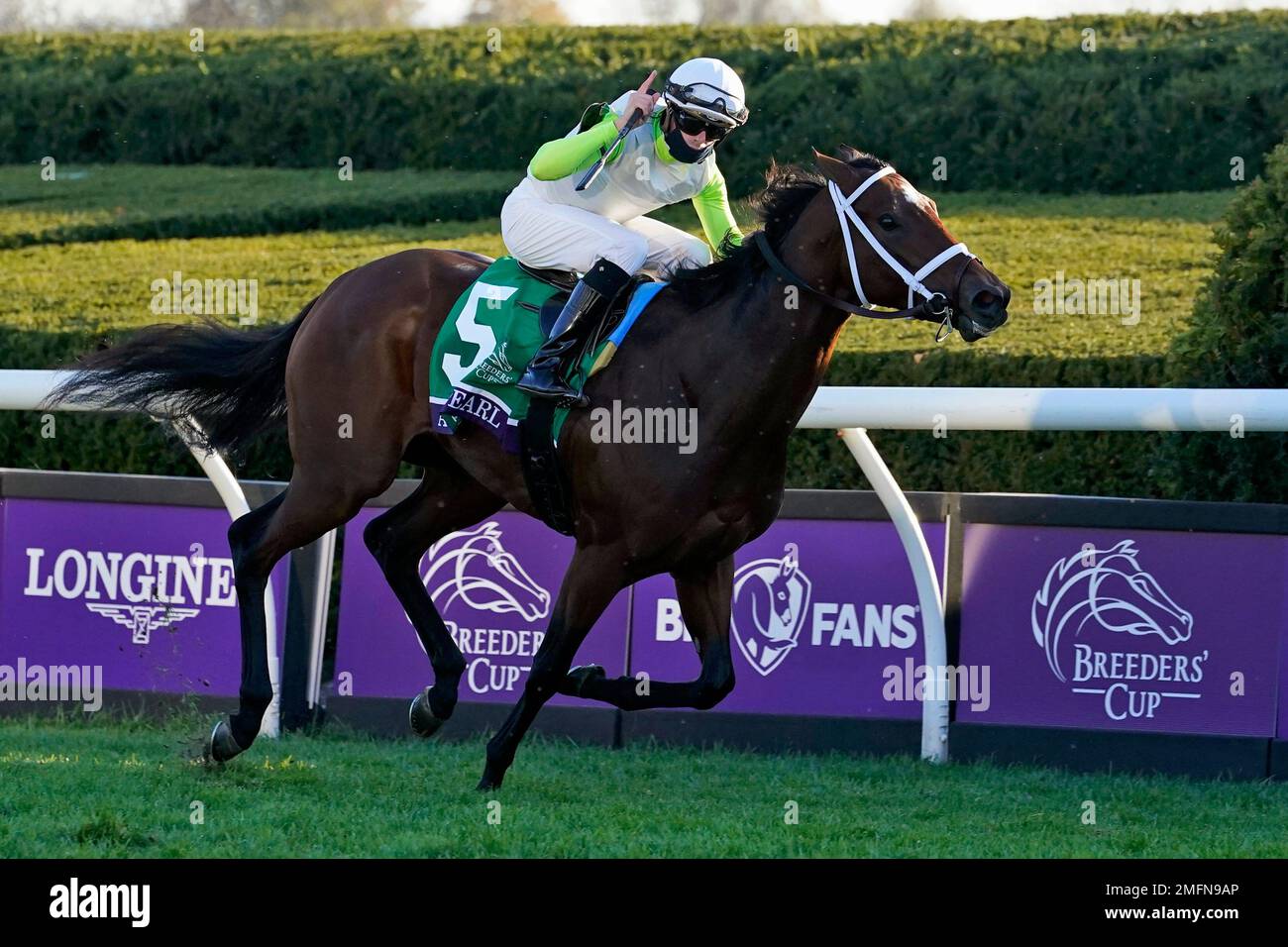 Jockey Florent Geroux, aboard Aunt Pearl, reacts as they win the ...