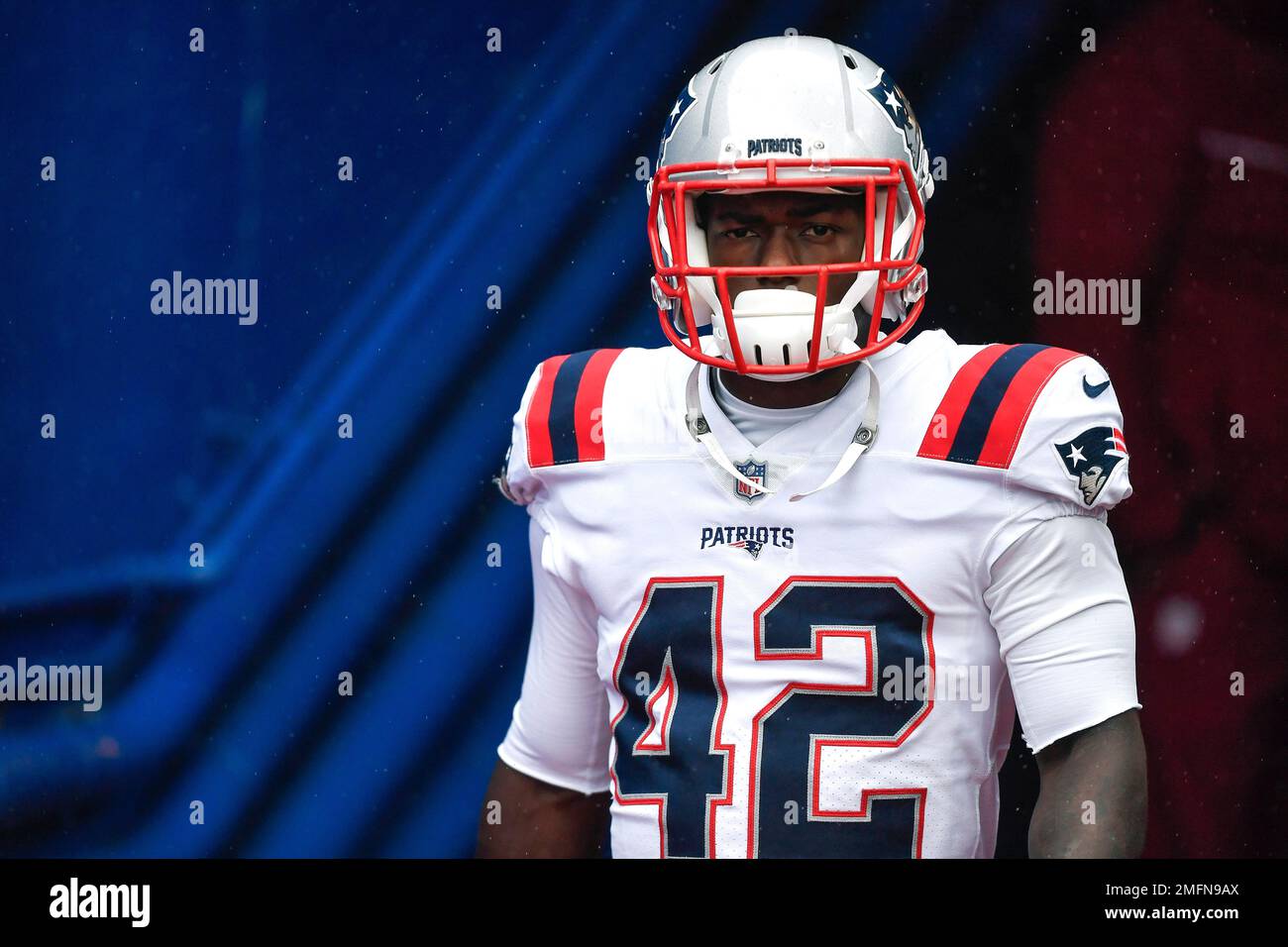 New England Patriots running back J.J. Taylor (42) walks out of the ...