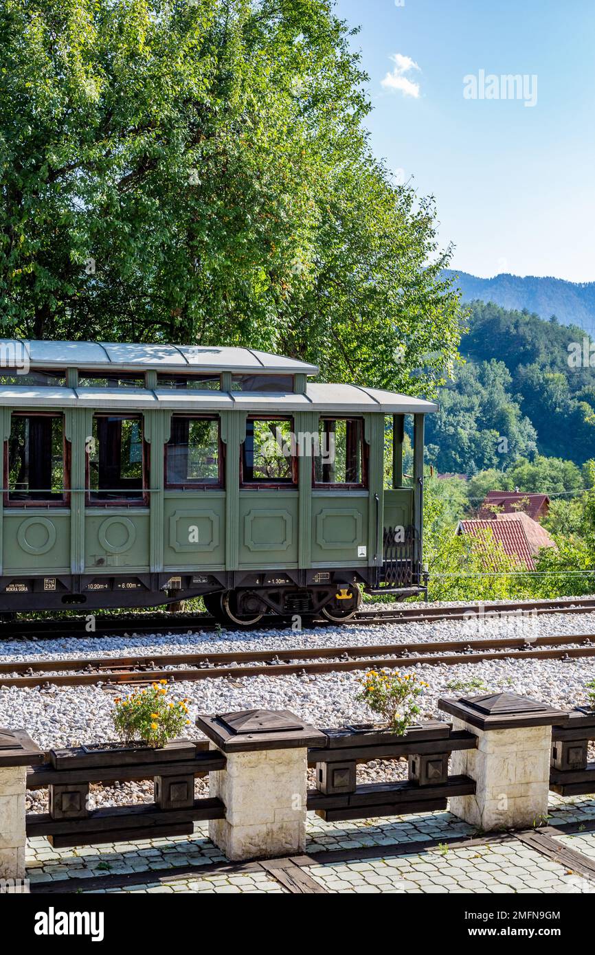 Old green vintage wagon of a tourist train in the station, Western ...