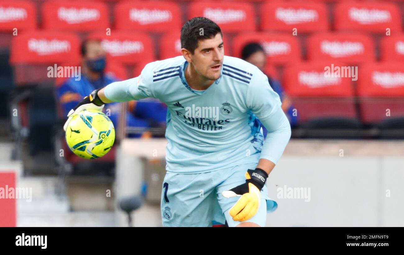 Real Madrid's goalkeeper Thibaut Courtois holds a ball during the ...