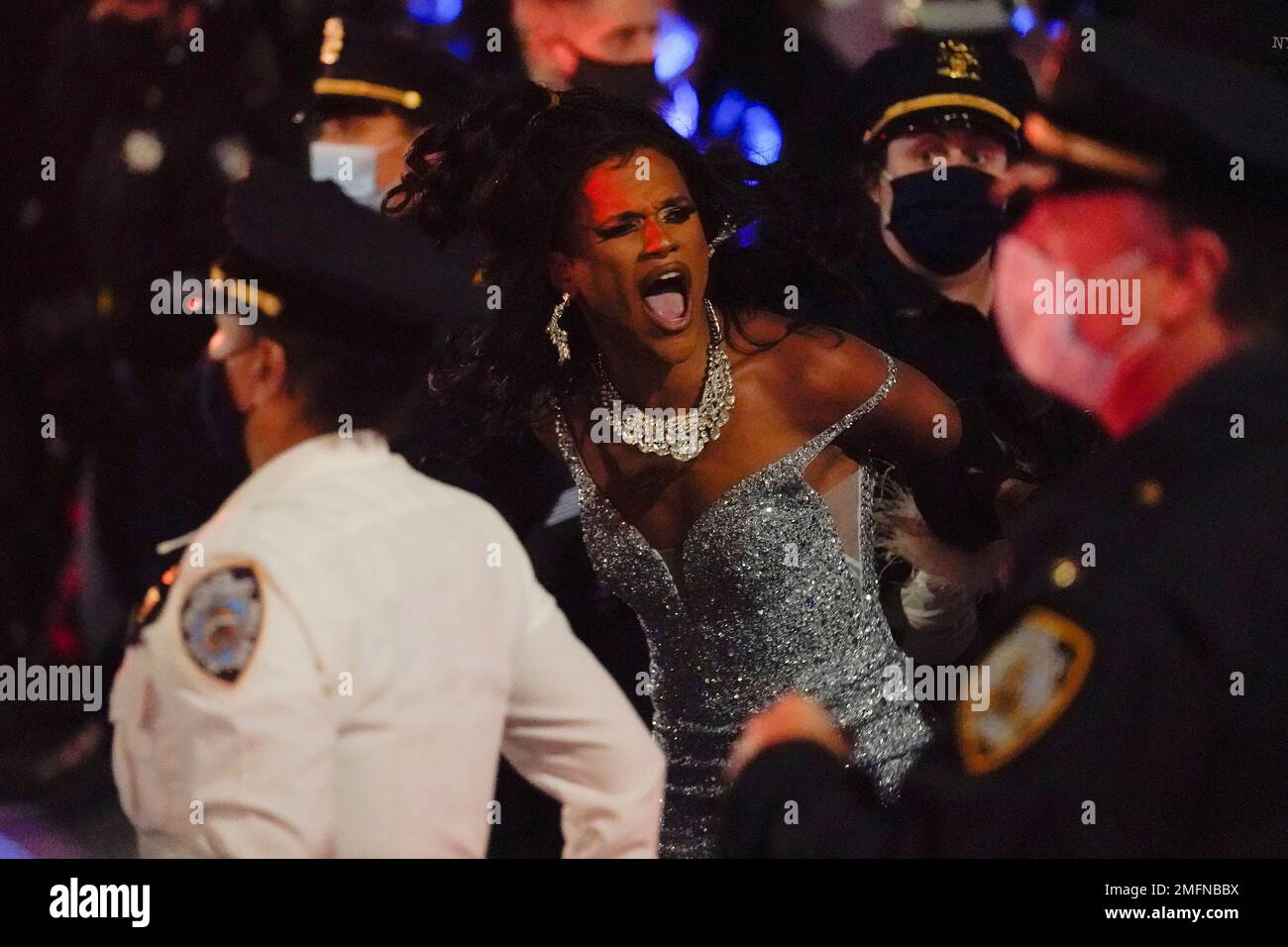 New York Police officers arrest a drag queen during a weekly "We Choose ...
