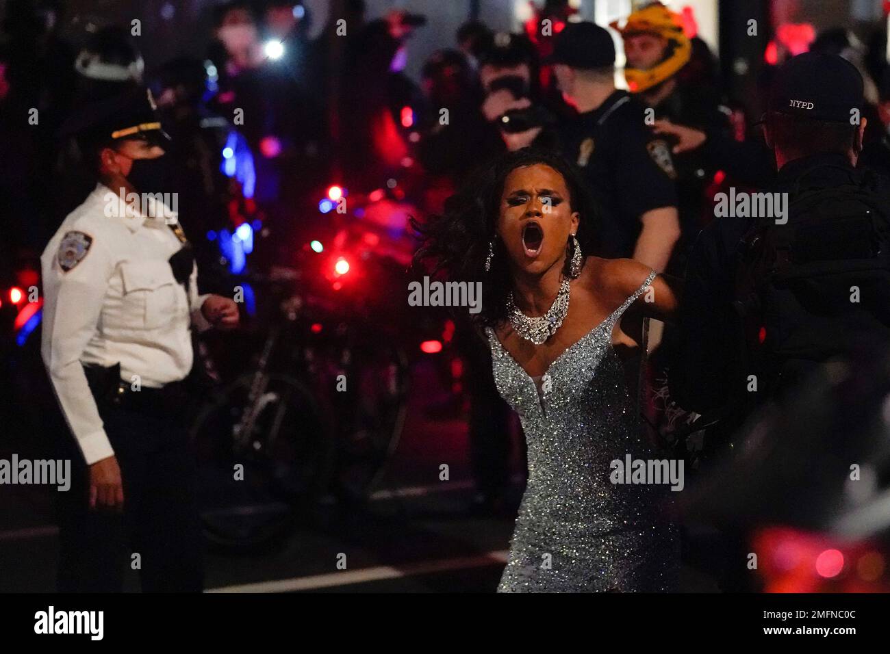 New York Police officers arrest a drag queen during a weekly "We Choose ...