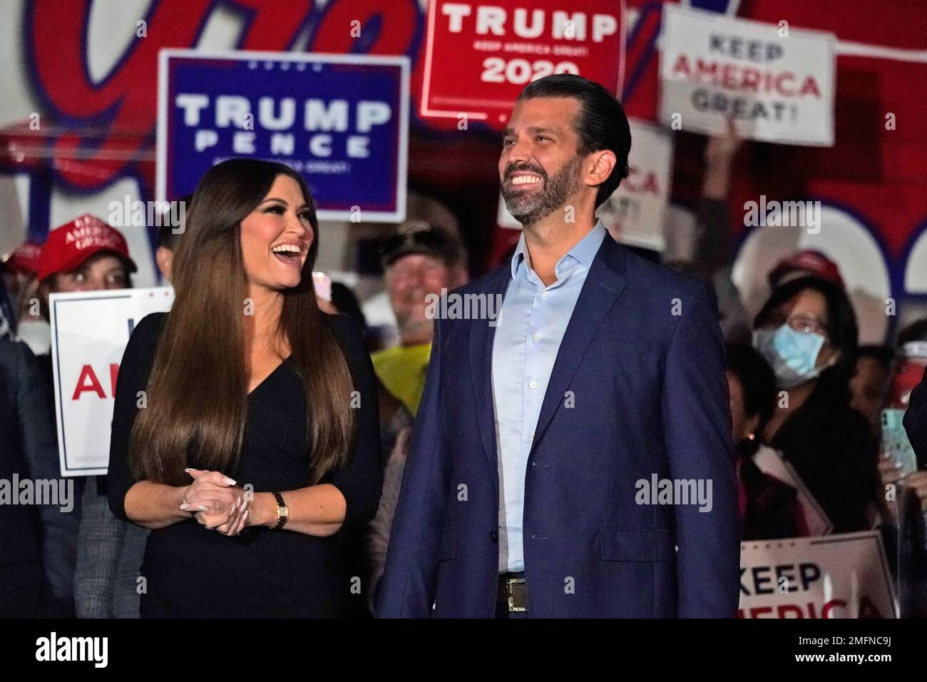 Donald Trump Jr., right, smiles along with his girlfriend Kimberly ...