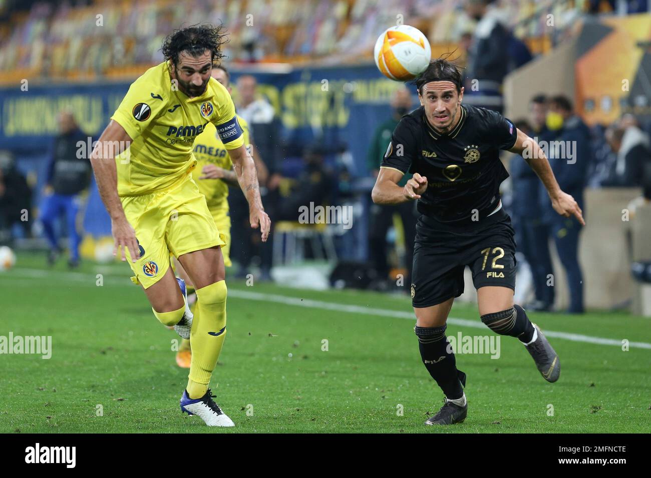 Maccabi Tel-Aviv's Ben Bitton, right, vies for the ball with Villareal ...