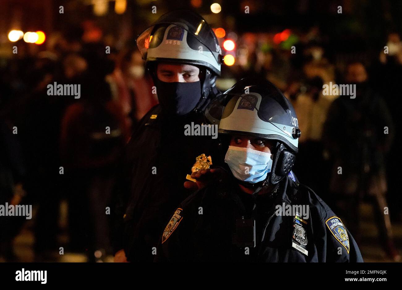 New York Police officers patrol a demonstration near Washington Square ...