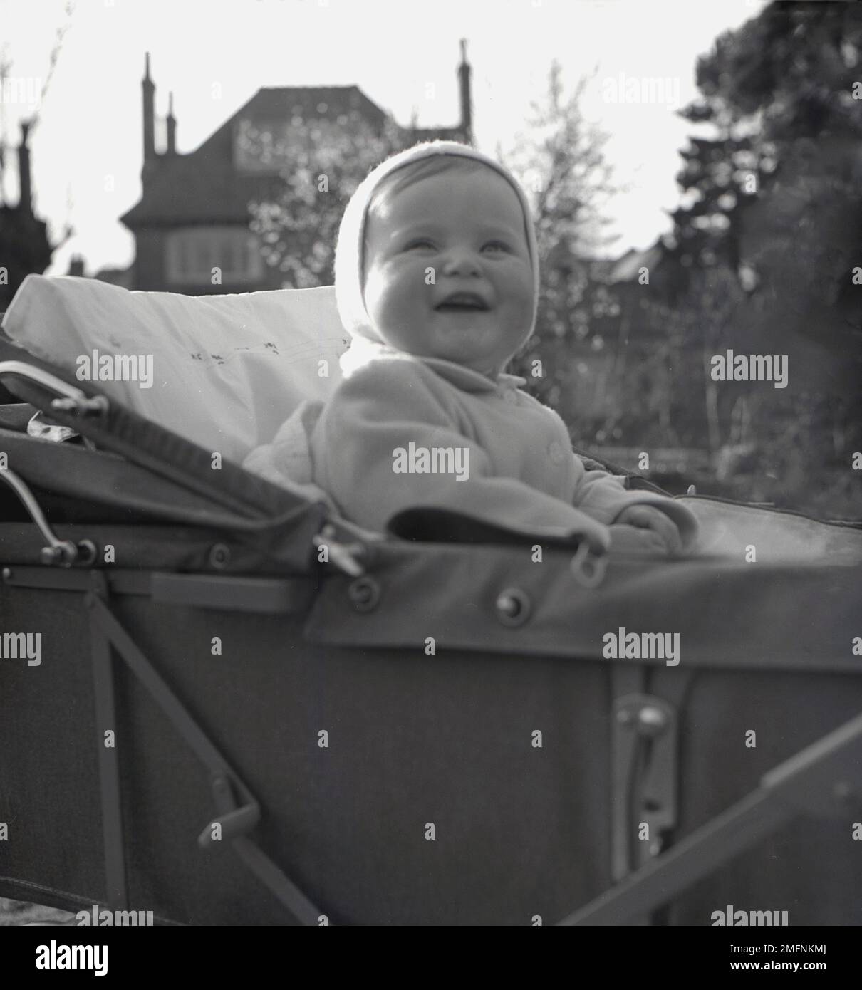 Baby outside in pram 1950s hi-res stock photography and images - Alamy