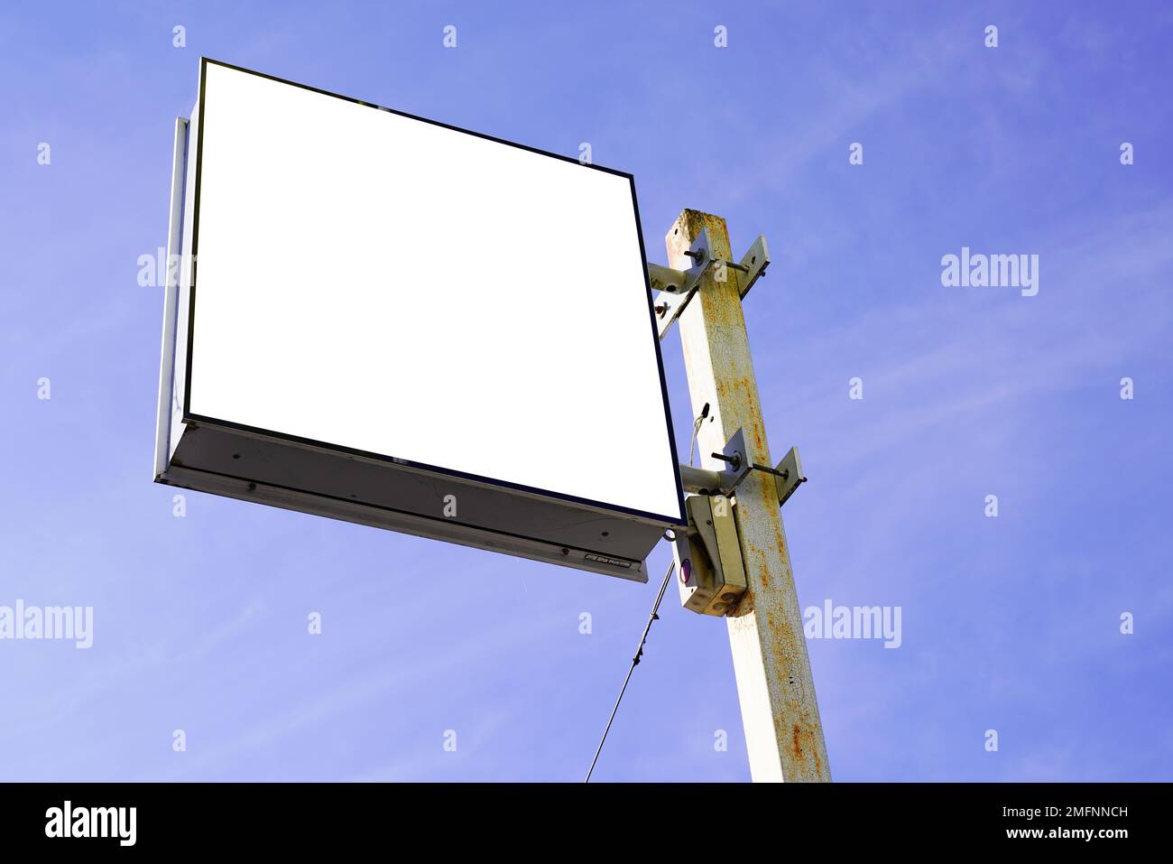 Blank empty white mockup signboard on facade shop wall Stock Photo - Alamy