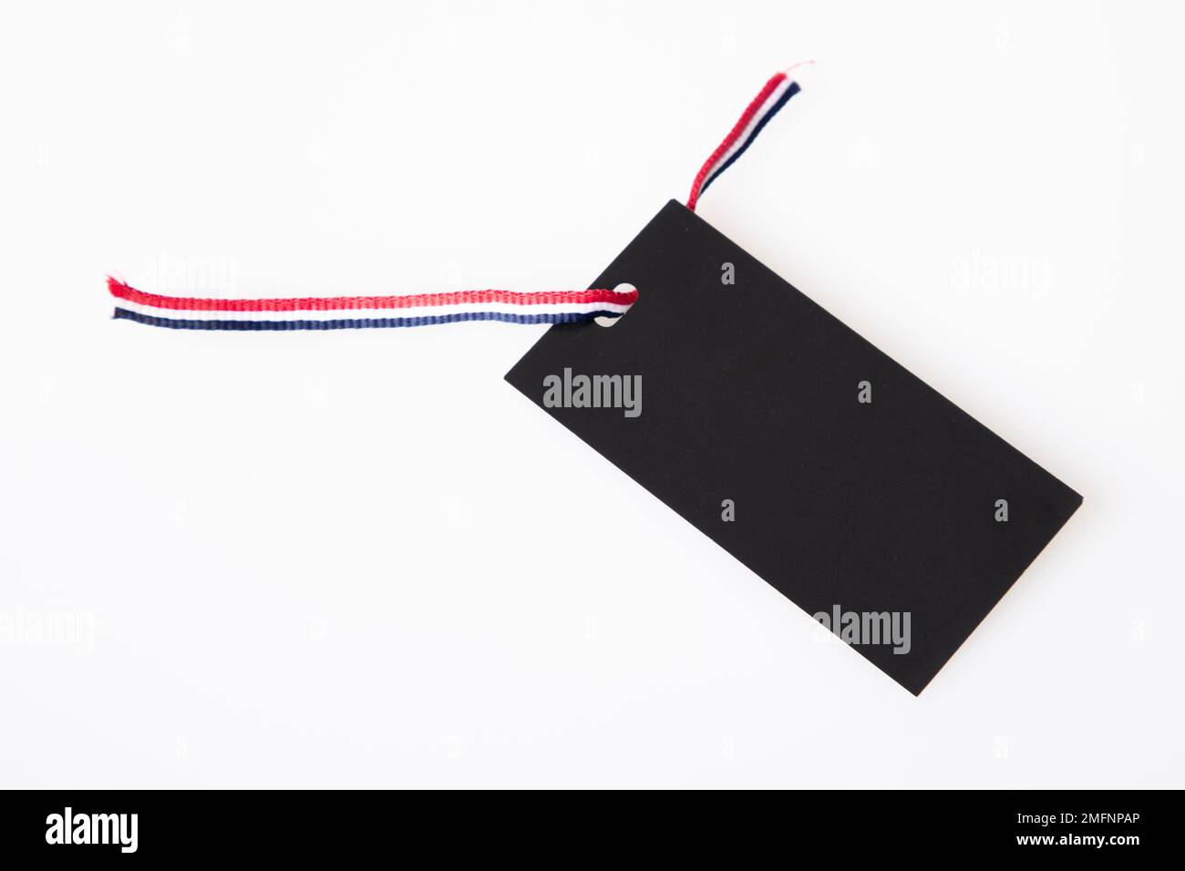black tag label with tricolor ribbon blue white red isolated in white ...