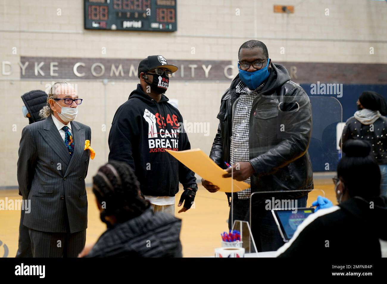 Terrence Floyd, brother of George Floyd, center, waits with Sandy ...