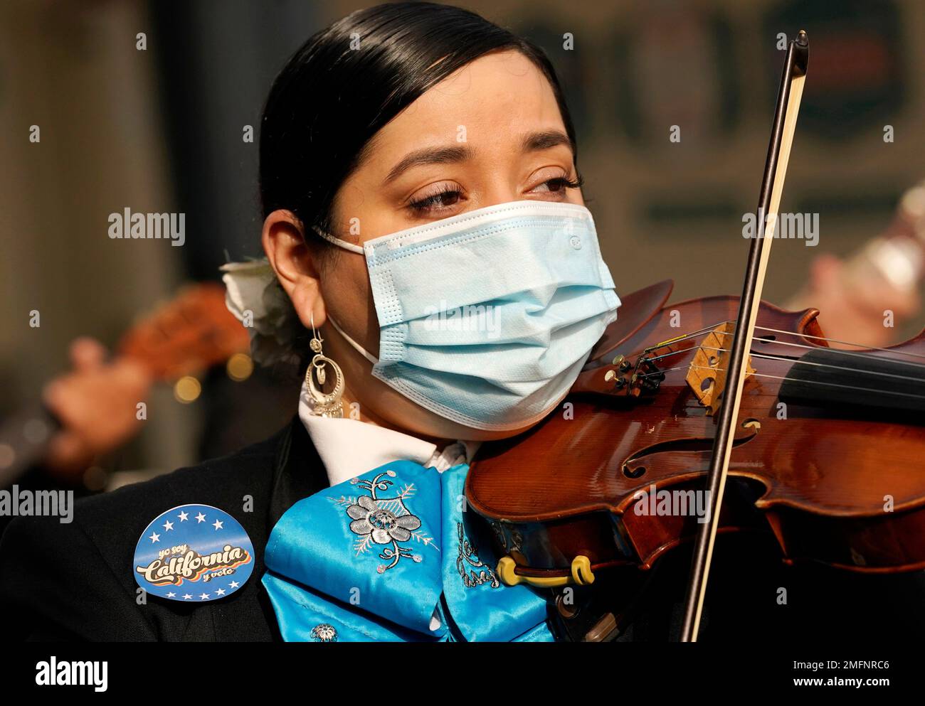 Jennifer Wake, a violin player in the Los Pasajeros mariachi band ...