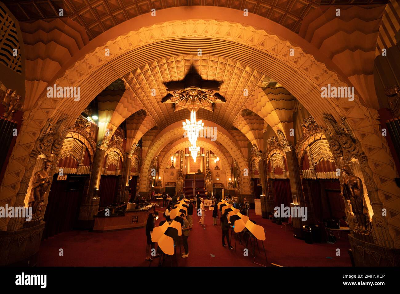 People cast their ballots at a vote center set up at the Hollywood ...