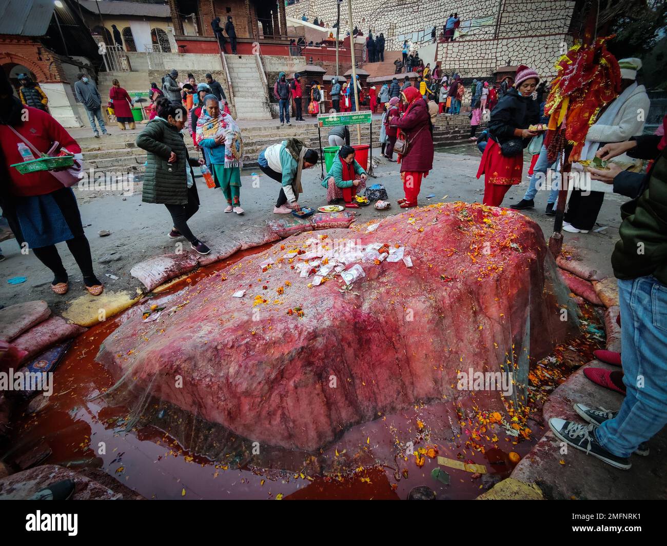 Kathmandu, Bagmati, Nepal. 25th Jan, 2023. People gather at the bank of the Shali River during ...