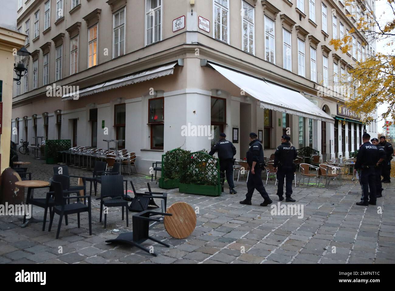 Police officers guard the crime scene at a bar in Vienna, Austria ...
