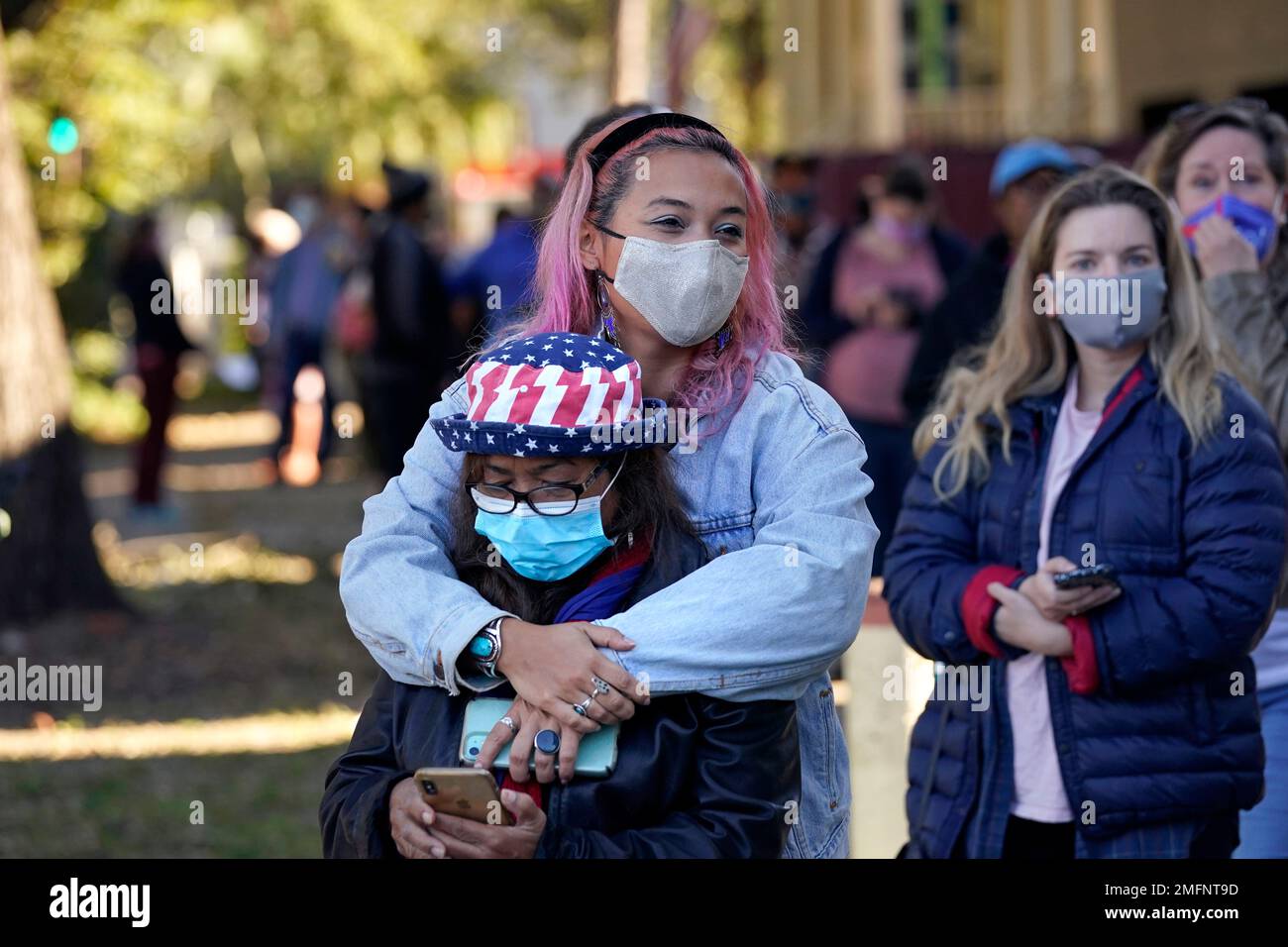 Erin Doherty hugs her mother Susanna Dew, 61, who is voting for the ...