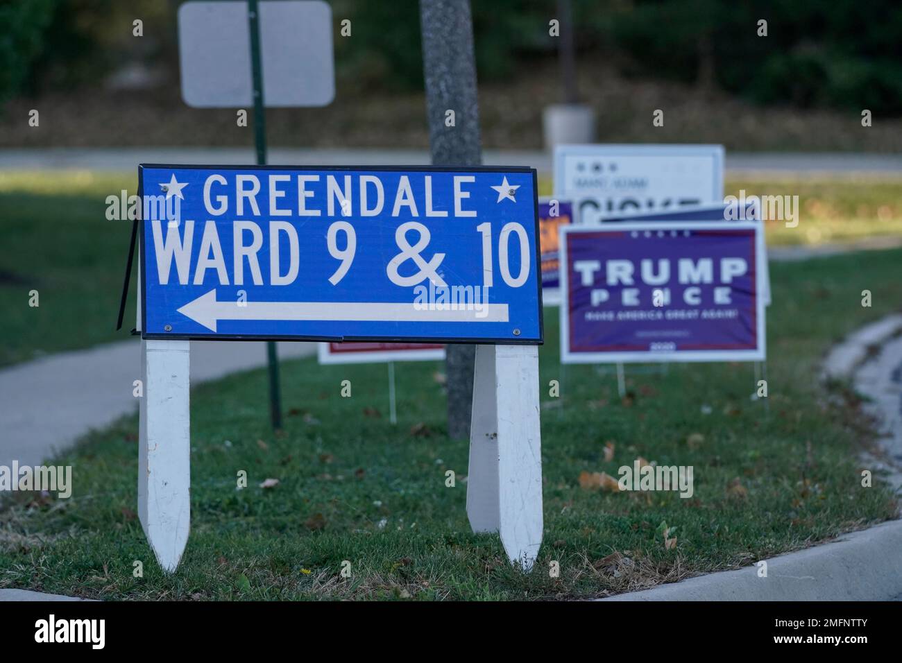 Political signs are seen outside the Greendale Police station and ...