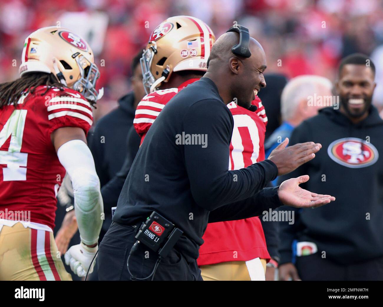 FILE - San Francisco 49ers defensive coordinator DeMeco Ryans celebrate ...