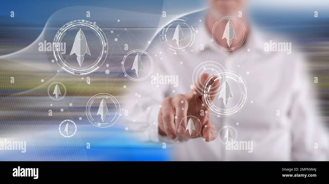 Man touching a start up concept on a touch screen with his finger Stock ...