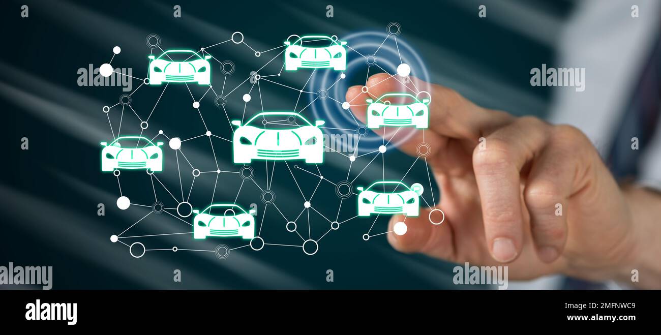 Man touching a smart car concept on a touch screen with his finger ...