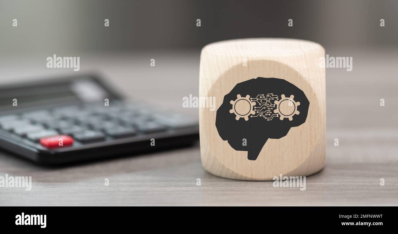 Wooden block with symbol of deep learning concept and calculator on ...