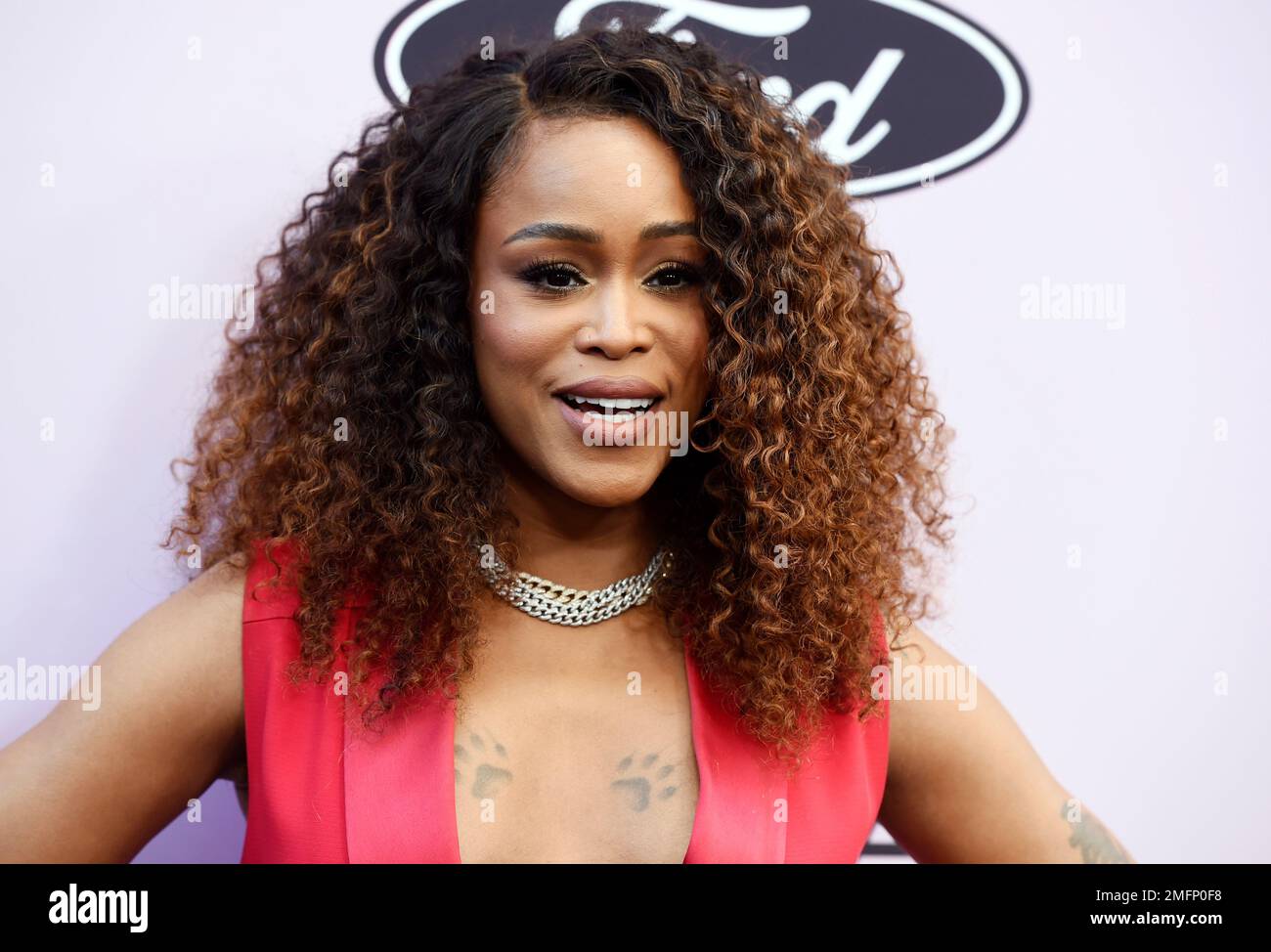 FILE - Eve poses at the 13th annual ESSENCE Black Women in Hollywood ...