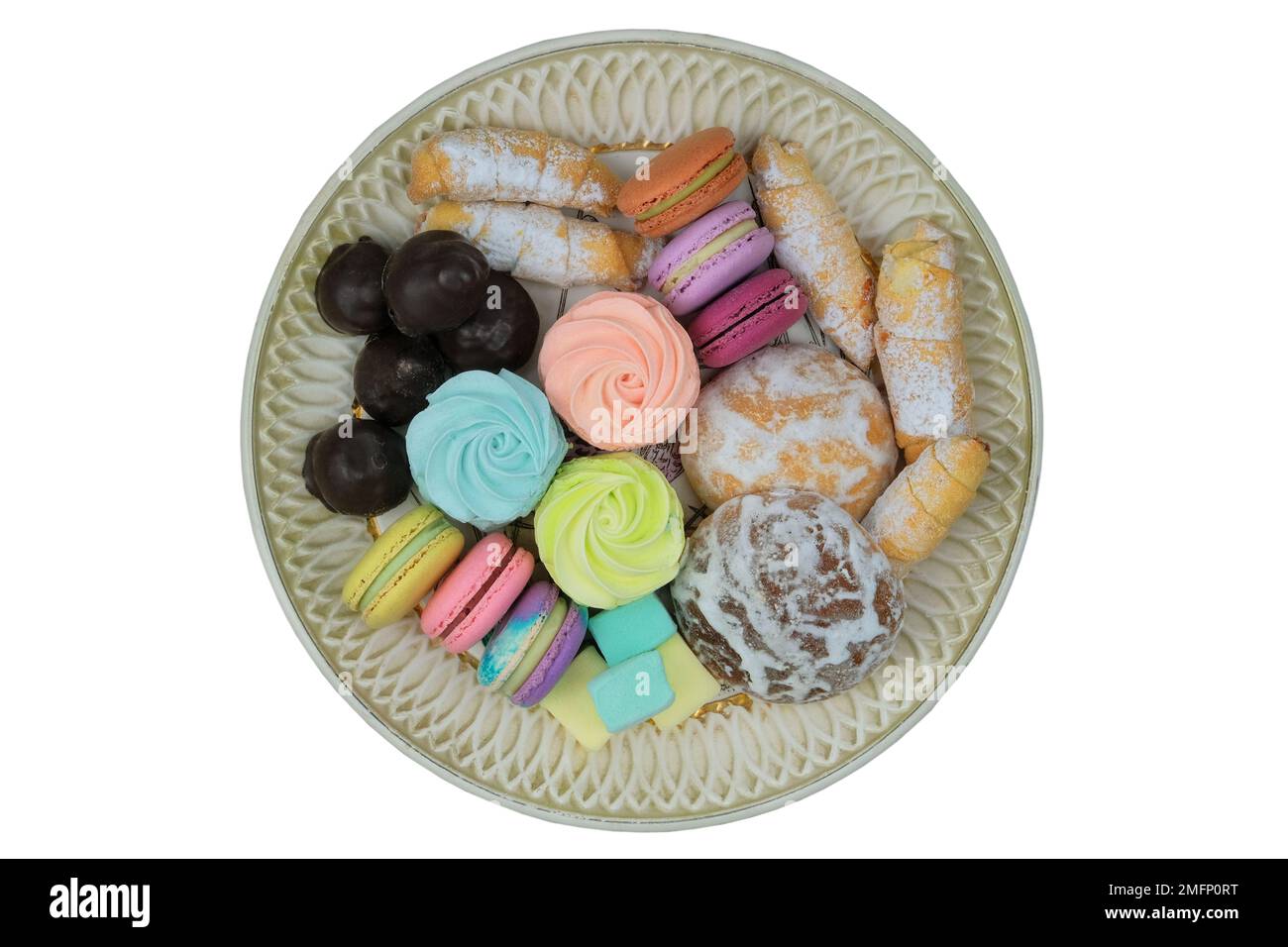 Sweet desserts in plate for the holiday. Marshmallows, macaroons, cake ...