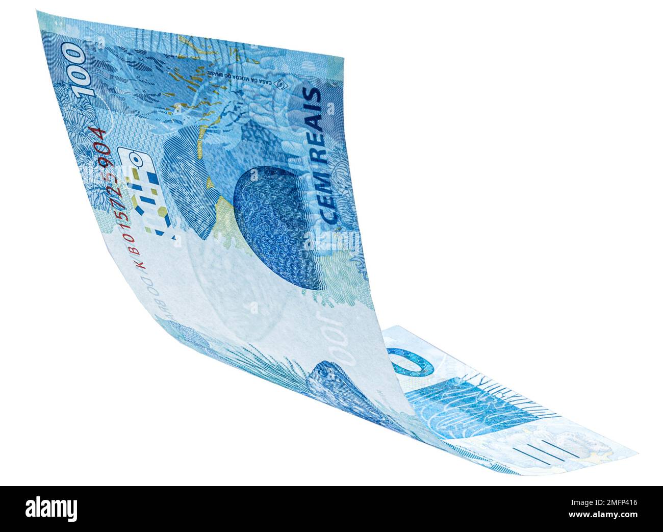 banknote of one hundred reais from brazil falling on isolated white ...