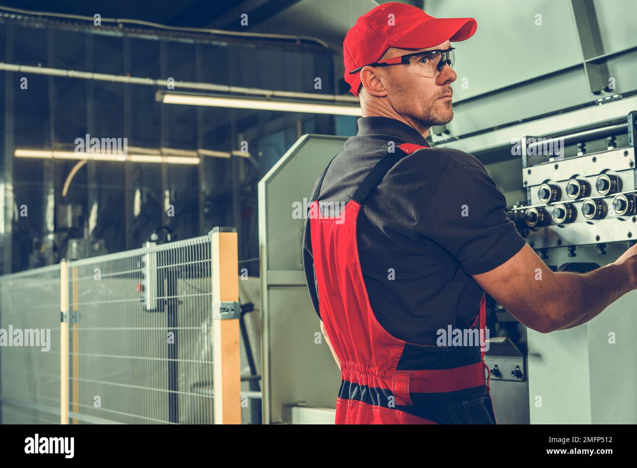 Automatic Metal Wire Bending Machine Operator in His 40s. Professional ...