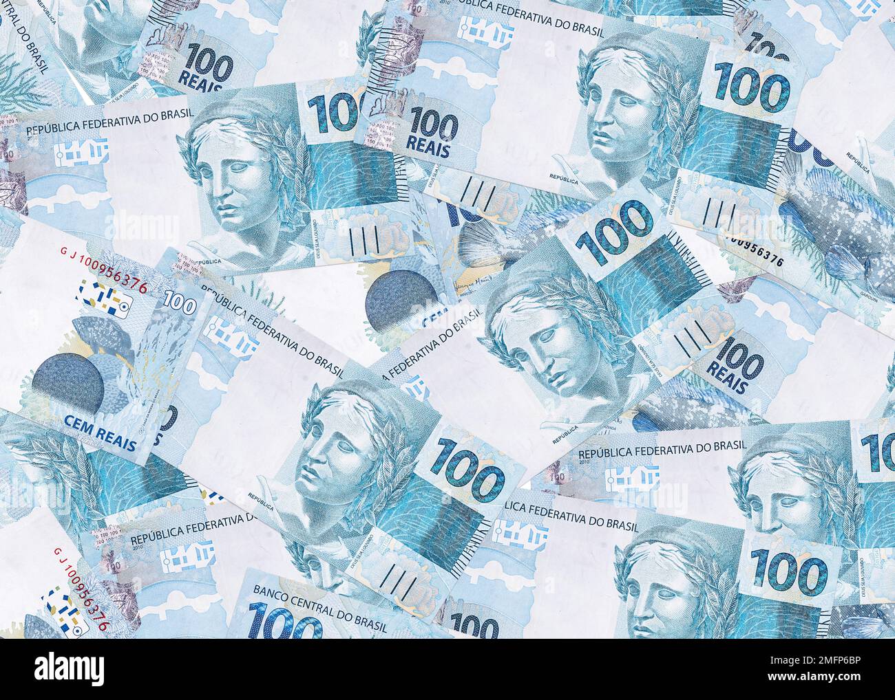 several banknotes of one hundred reais from brazil, texture of ...
