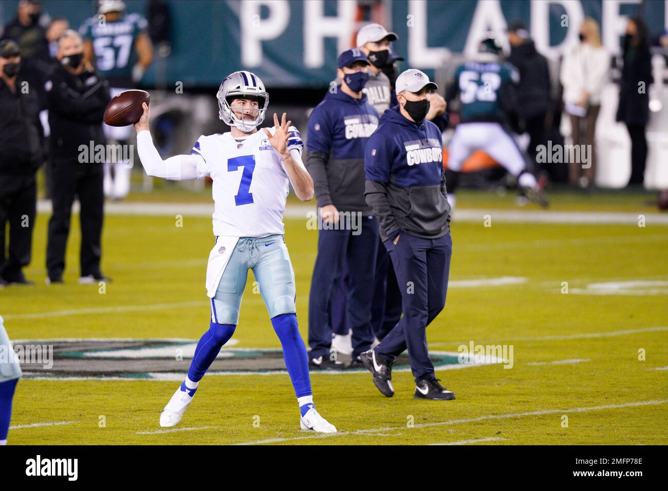Dallas Cowboys' Ben DiNucci warms up before an NFL football game ...