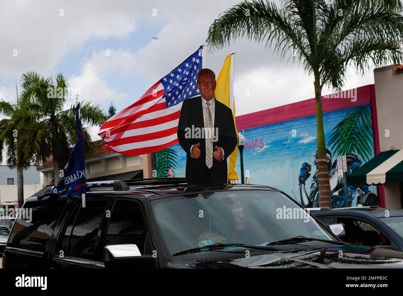 Supporters of President Donald Trump drive in caravan down Calle Ocho ...