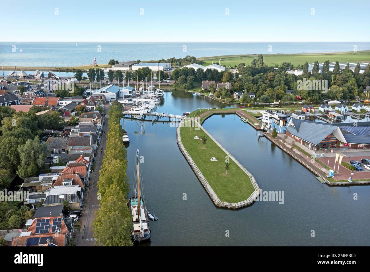 Aerial from the harbor and city Stavoren at the IJsselmeer in the ...