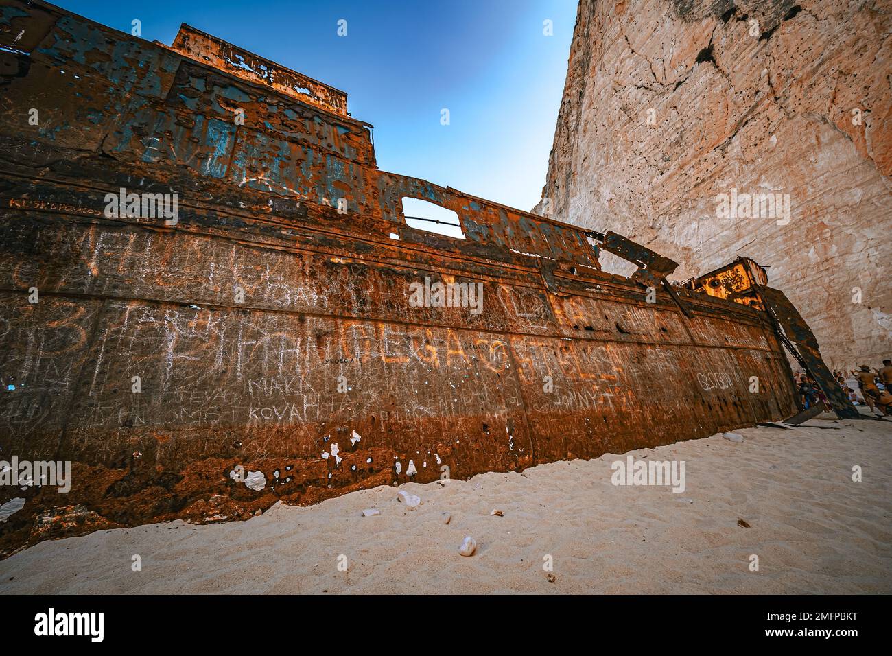 Fantastic view of the old rusty shipwreck stranded on the beach of ...