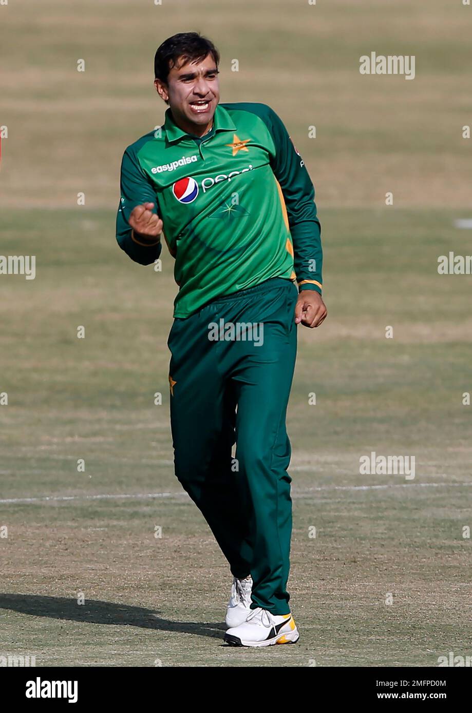 Pakistani spinner Iftikhar Ahmed celebrates after taking the wicket of ...