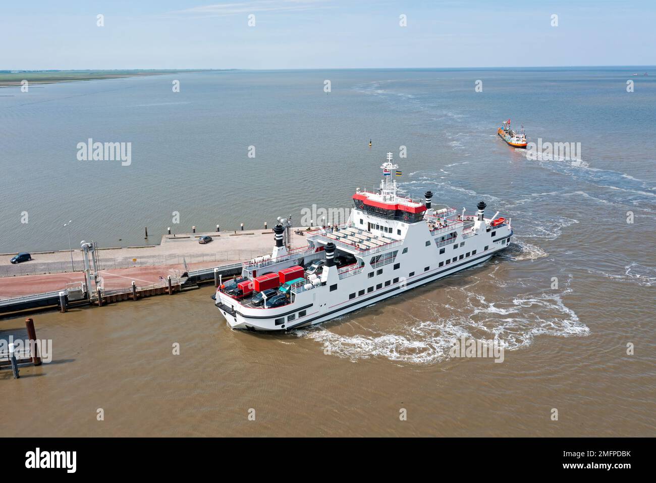 Aerial from the ferry arriving at Holwerd on the Wadden Sea in the ...