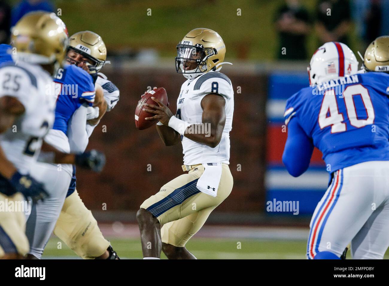 Navy quarterback Dalen Morris (8) looks for an open receiver during an ...