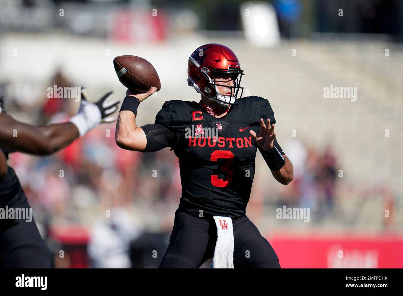 Houston quarterback Clayton Tune (3) looks to pass during an NCAA ...