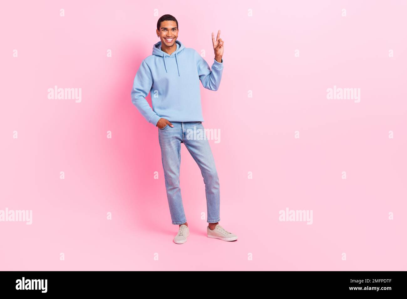 Photo of joyful stylish man wear trendy outfit sportswear stand empty ...