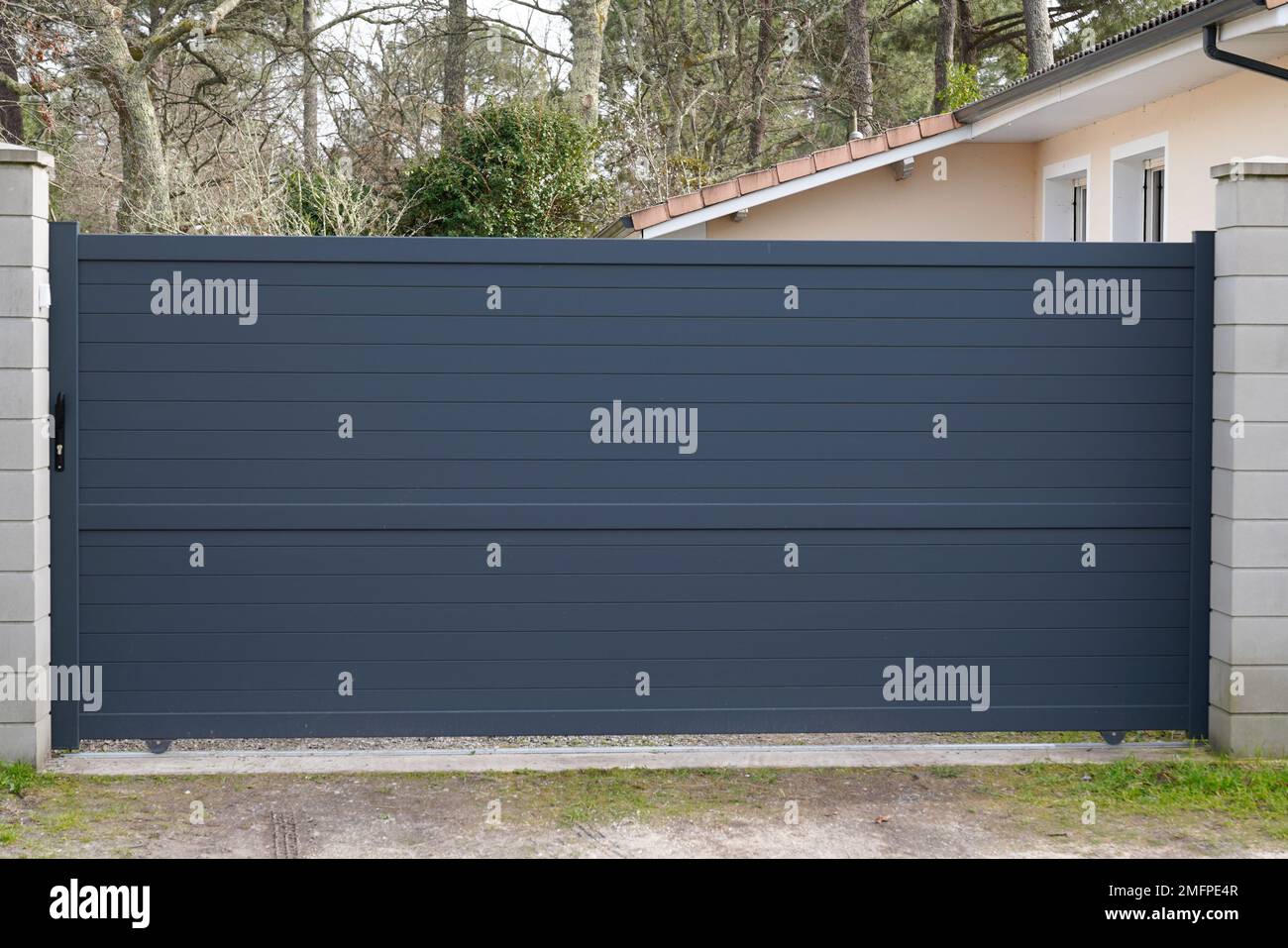 grey dark house steel sliding door aluminum gate at modern home ...