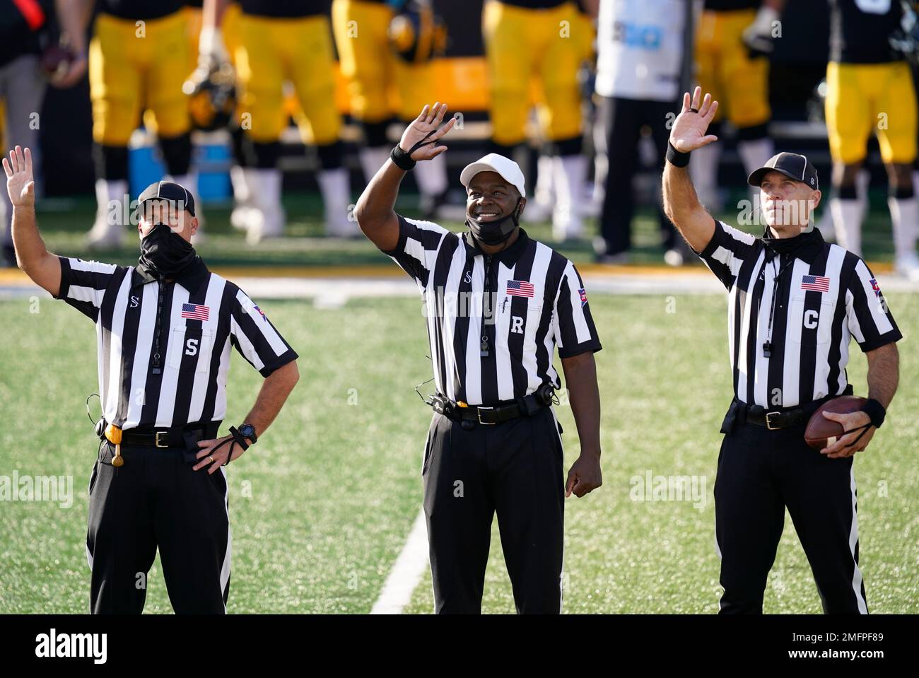 Officials wave to children in the University of Iowa Stead Family ...