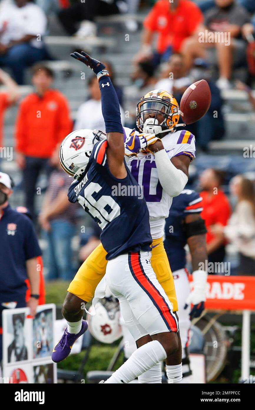 Auburn defensive back Jaylin Simpson (36) breaks up a pass intended for ...