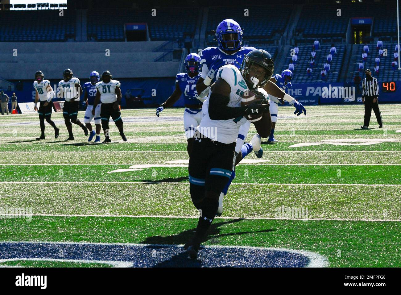 Coastal Carolina running back CJ Marable scores a touchdown on a ...