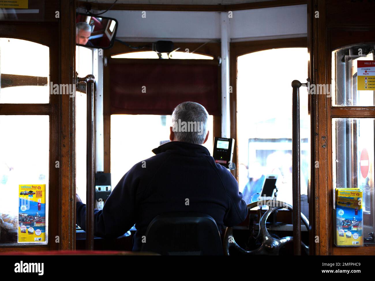 Lisbon historic yellow bus driver Stock Photo - Alamy