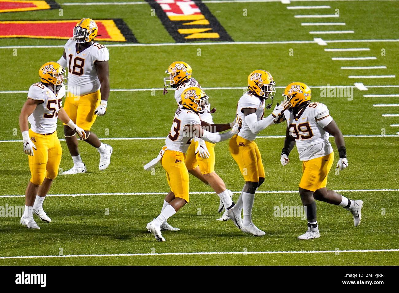 Minnesota players celebrate after defensive lineman DeAngelo Carter (99 ...