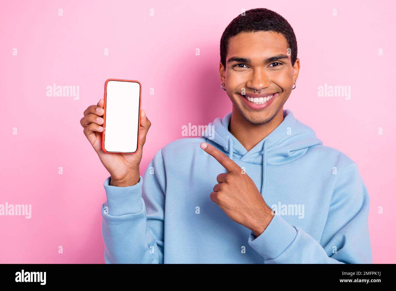Portrait photo of young funny promoter man short hair blue jumper ...