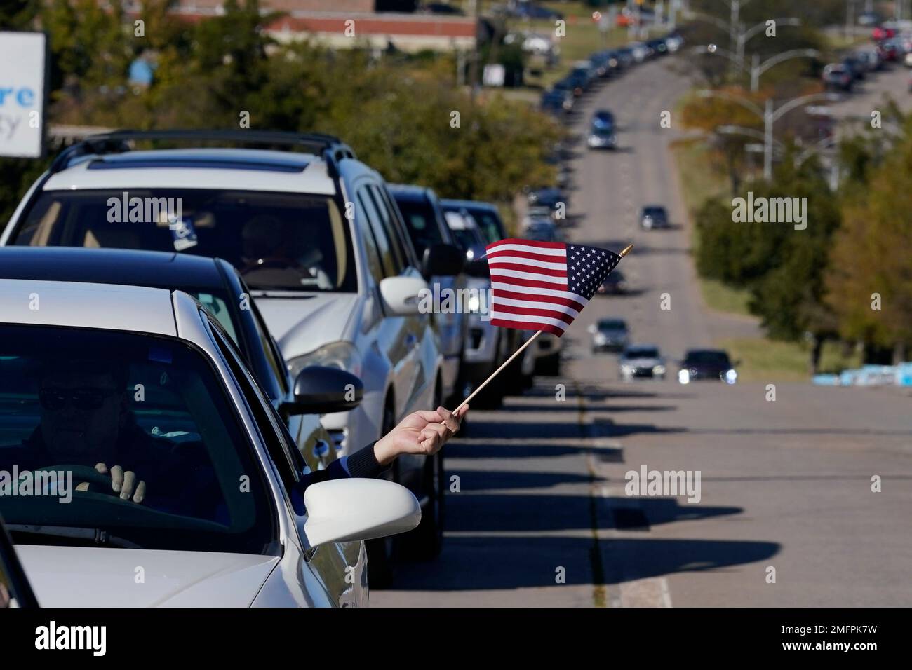 A long line of cars is pictured outside the Oklahoma County Election ...