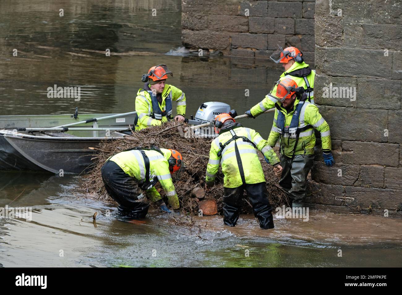 Environment Agency staff workers working in the River Wye at Hereford ...