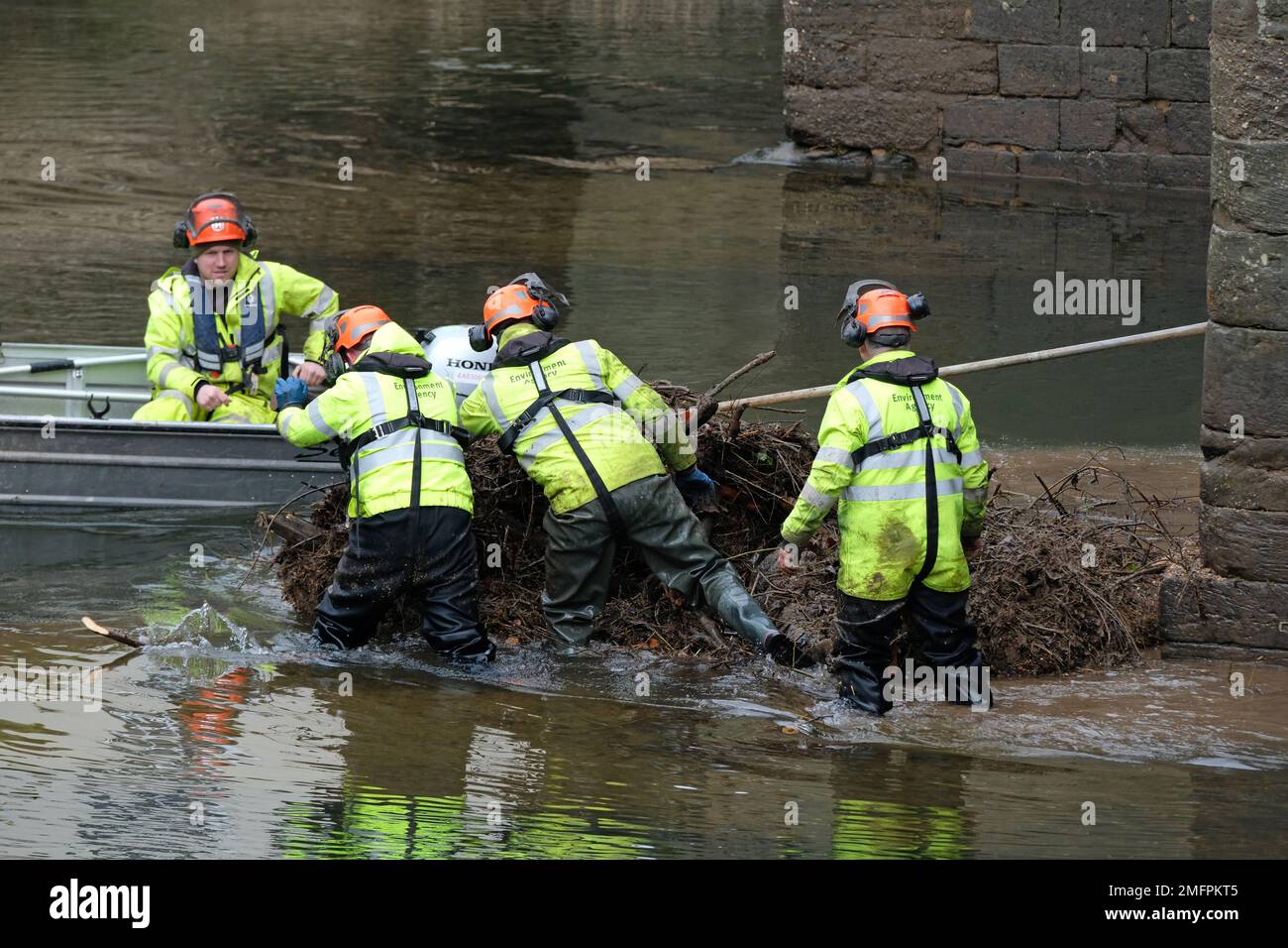 Environment Agency staff workers working in the River Wye at Hereford ...