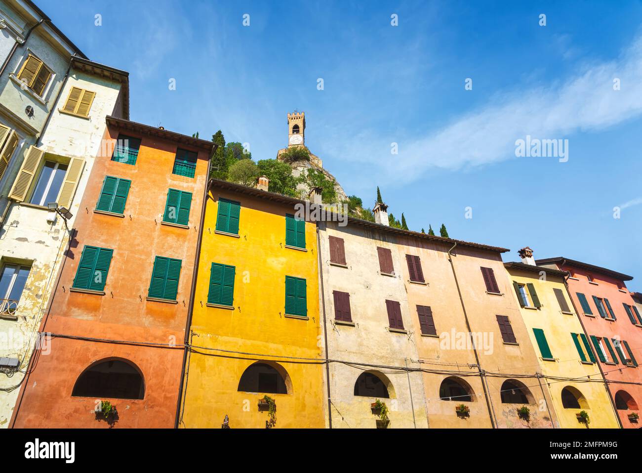 Brisighella historic clock tower and houses in old town. This 1800s ...