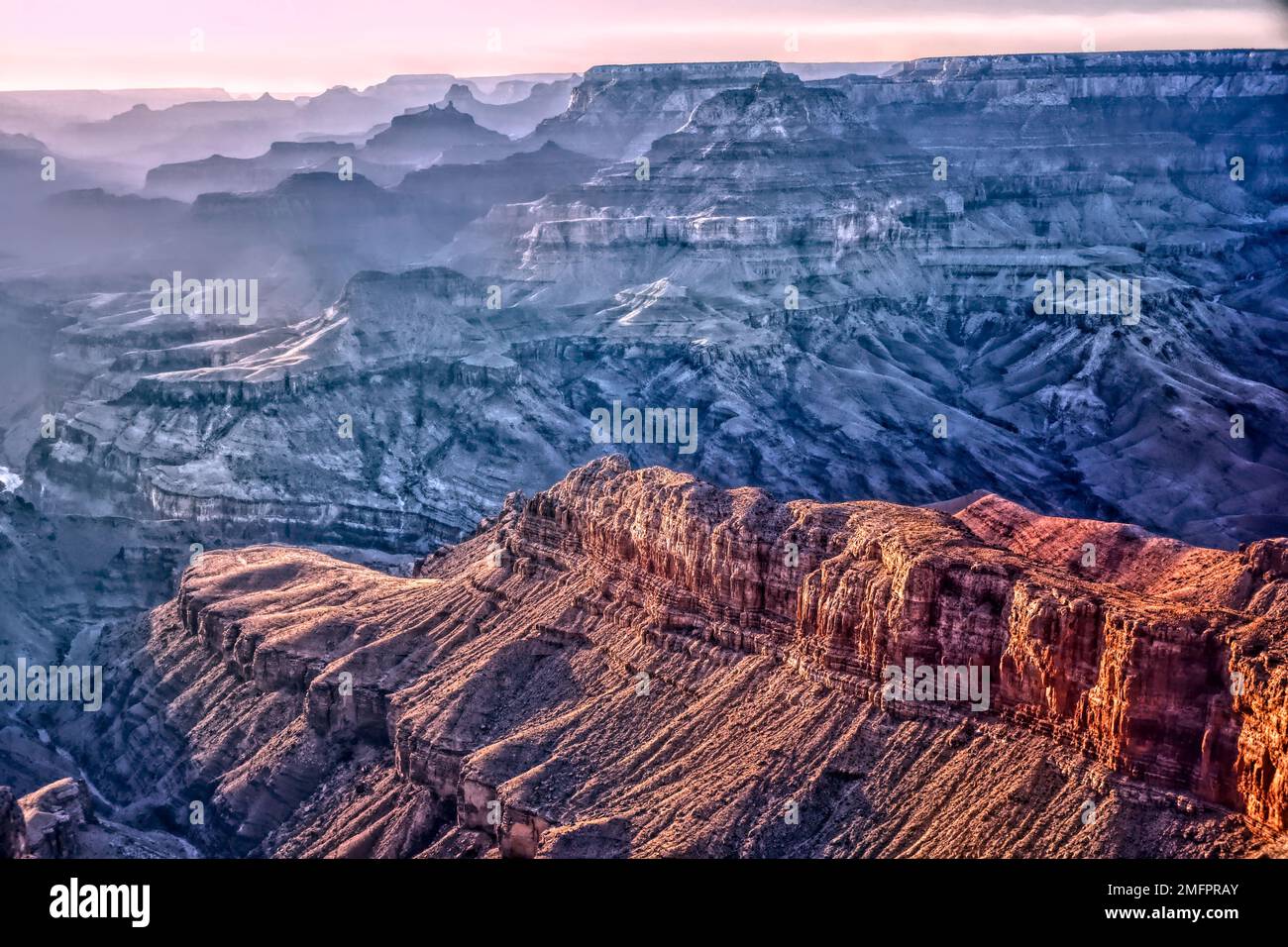 An aerial view of the Grand Canyon showing layers of rock formations ...